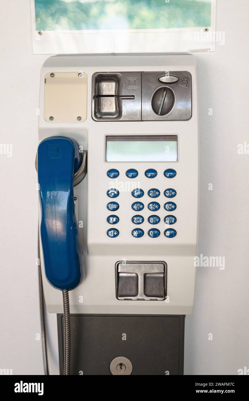 Old public telephone for making voice calls using coins or prepaid card ...