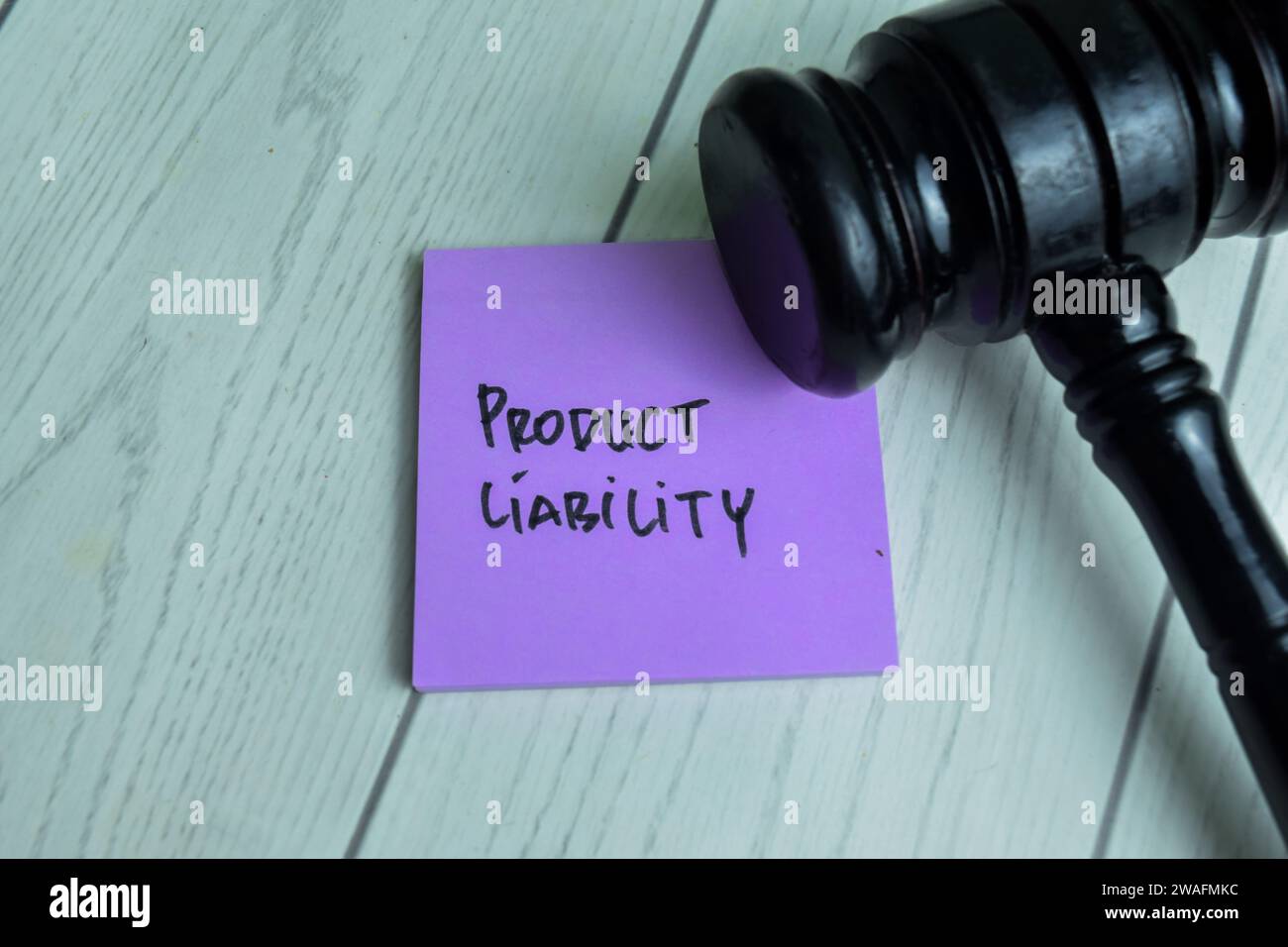 Concept of Product Liability write on sticky notes with gavel isolated ...