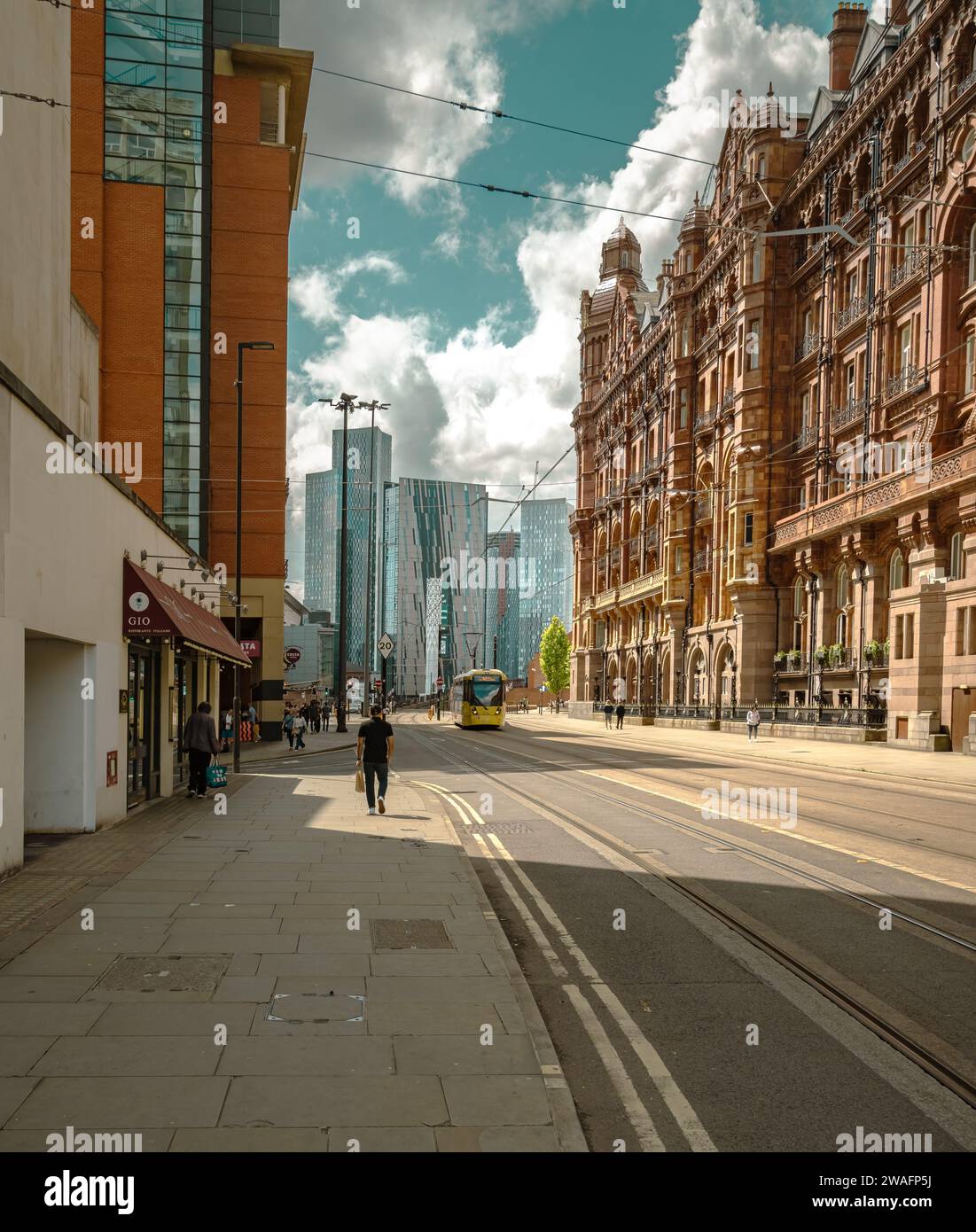 Tramlines run past the Edwardian Baroque Midland Hotel along Lower ...
