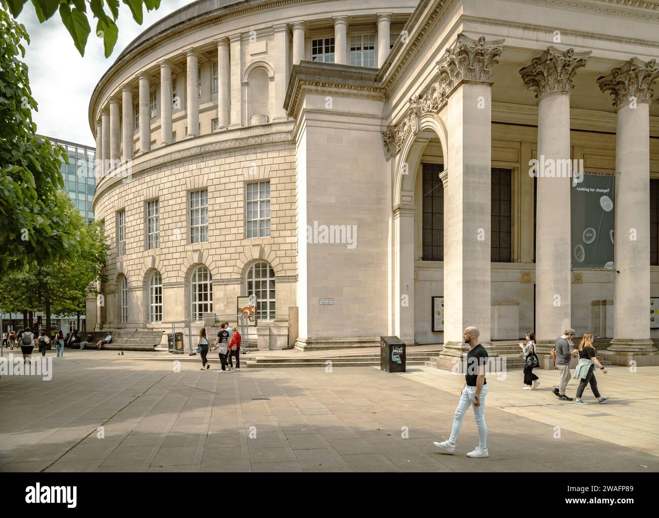 Pedestrians stroll across St. Peter's Square overlooked by the stunning ...