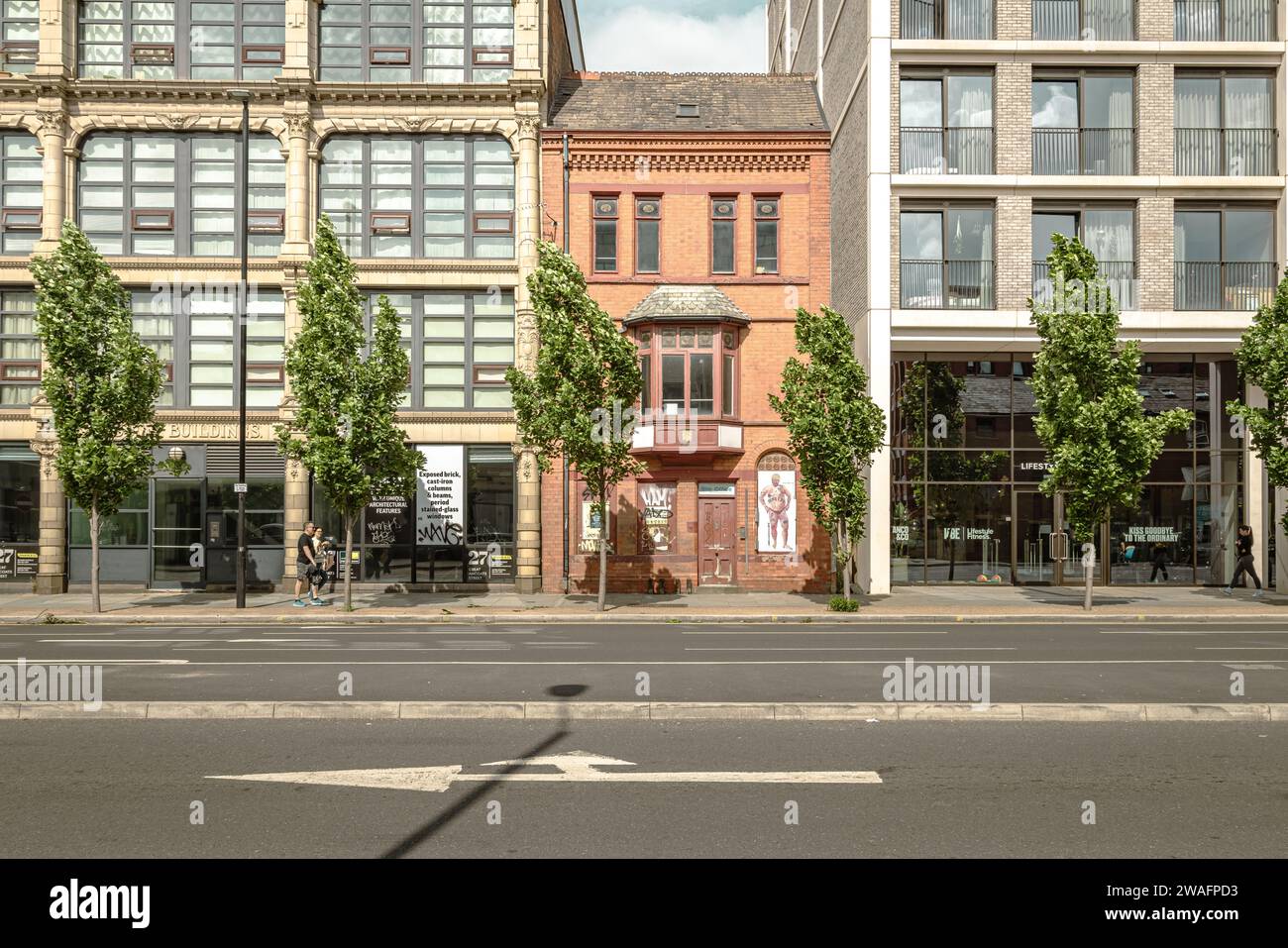 An historic red brick building on the edge of Manchester City Centre ...