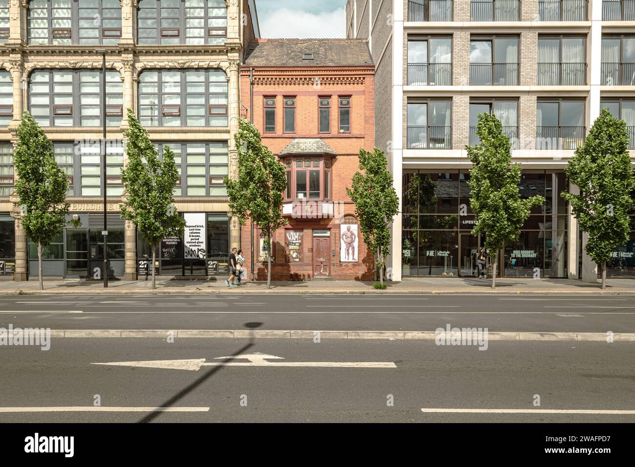 An historic red brick building on the edge of Manchester City Centre ...