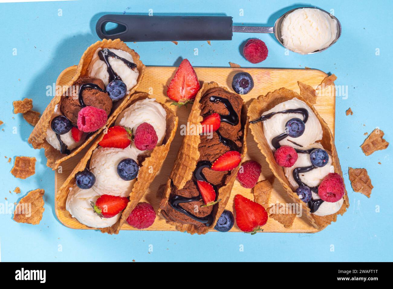 Various sweet taco ice creams. Waffle taco shells with chocolate and ...