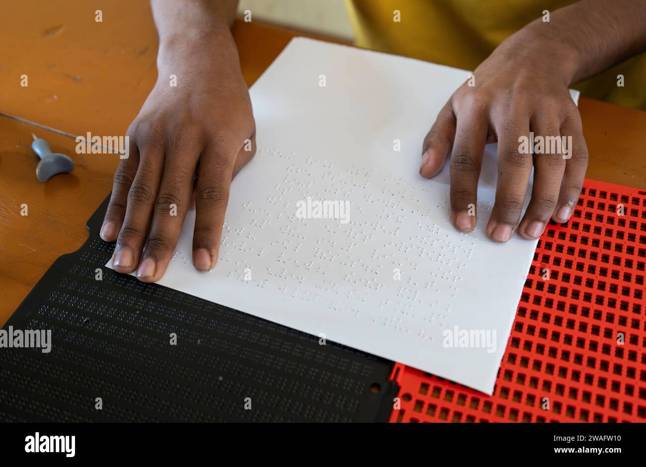 Visually impaired students reads using the Braille system at Guwahati ...