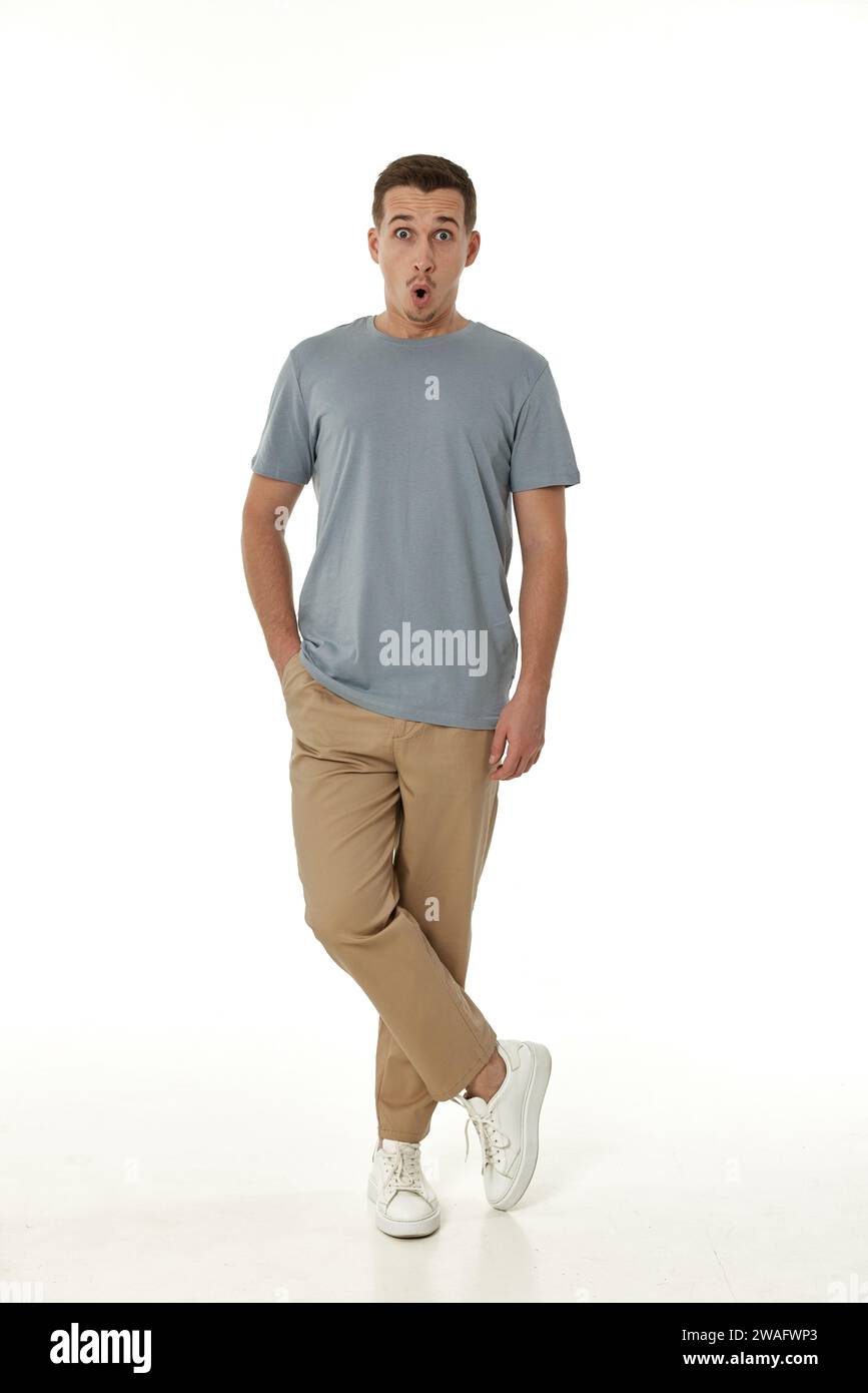 surprised guy looking at camera on white studio background Stock Photo ...