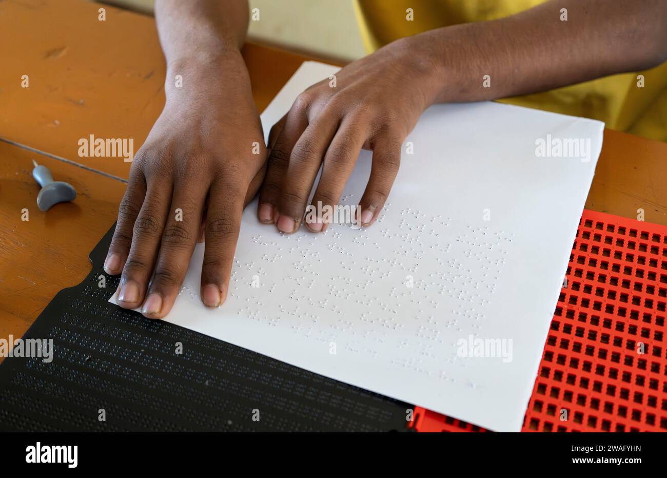 January 4, 2024: Visually impaired students reads using the Braille ...