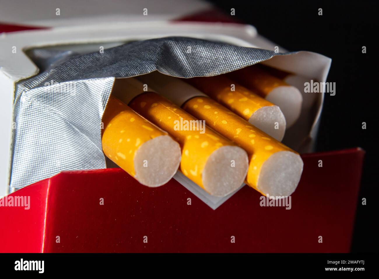 Close up cigarette in pack is addictive to be cancer.smoking reduction ...