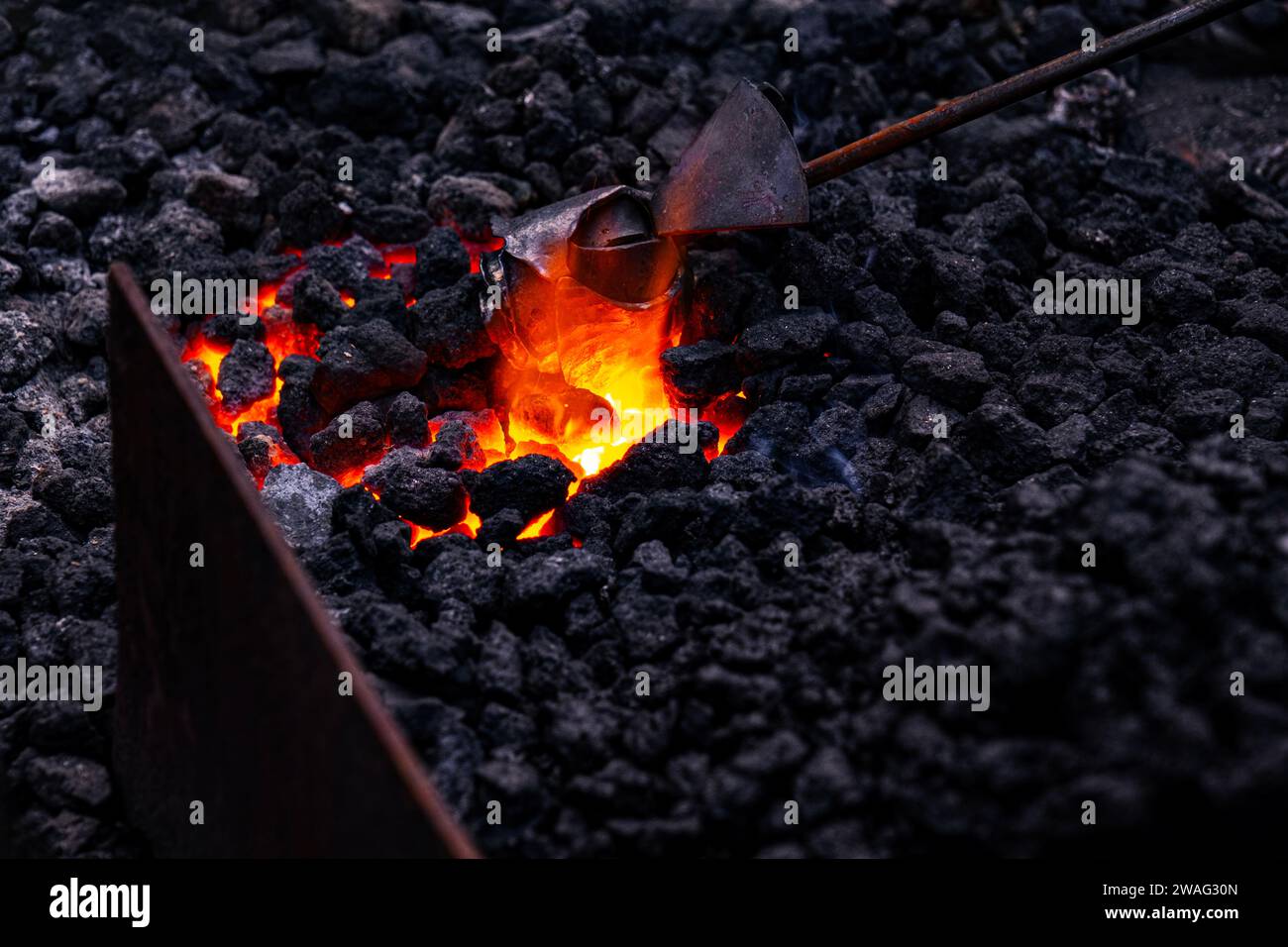 forging metal in blacksmith workshop Stock Photo - Alamy