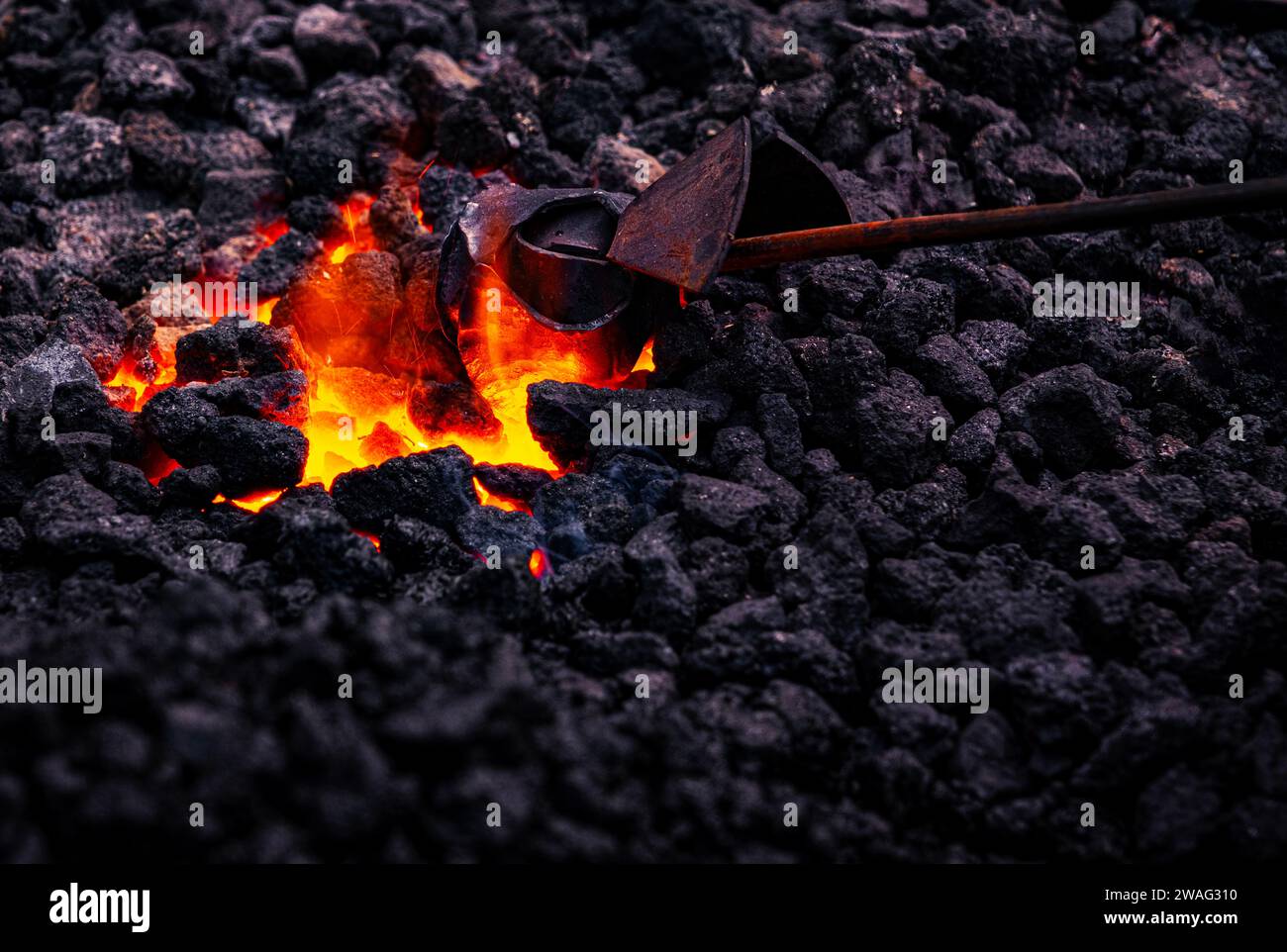 forging metal in blacksmith workshop Stock Photo - Alamy