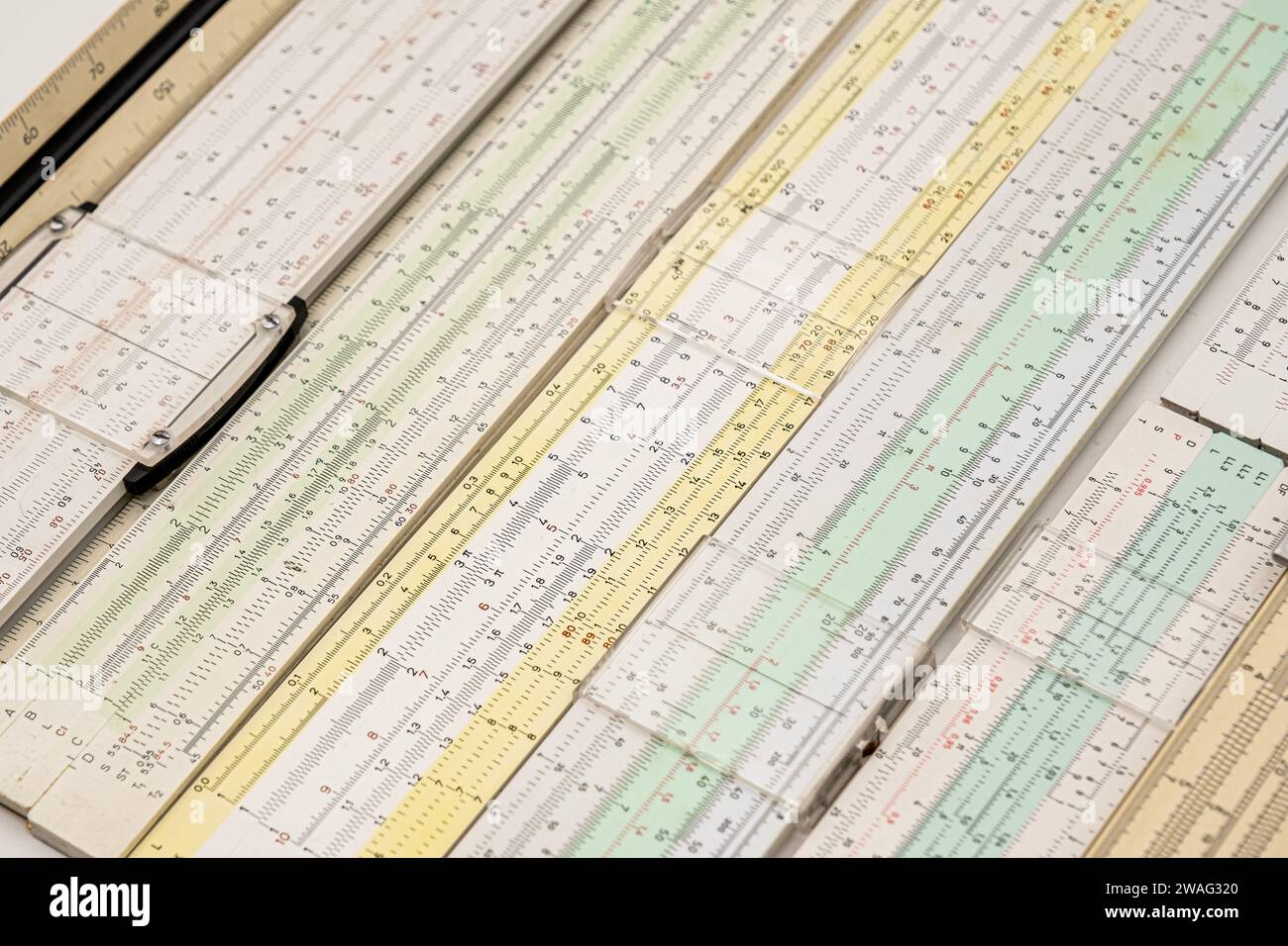 group of old slide rule slipstick analogue computer for mathematical ...