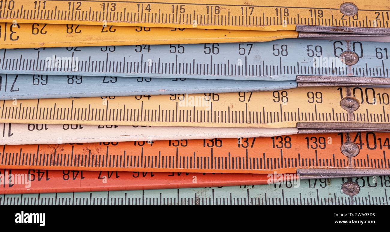 Old wooden folding meter ruler measuring centimeters Stock Photo - Alamy