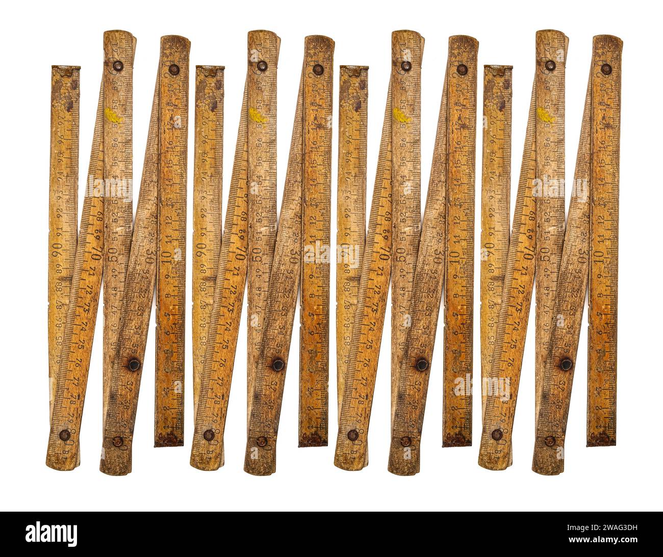 Old wooden folding meter ruler measuring centimeters on the white ...