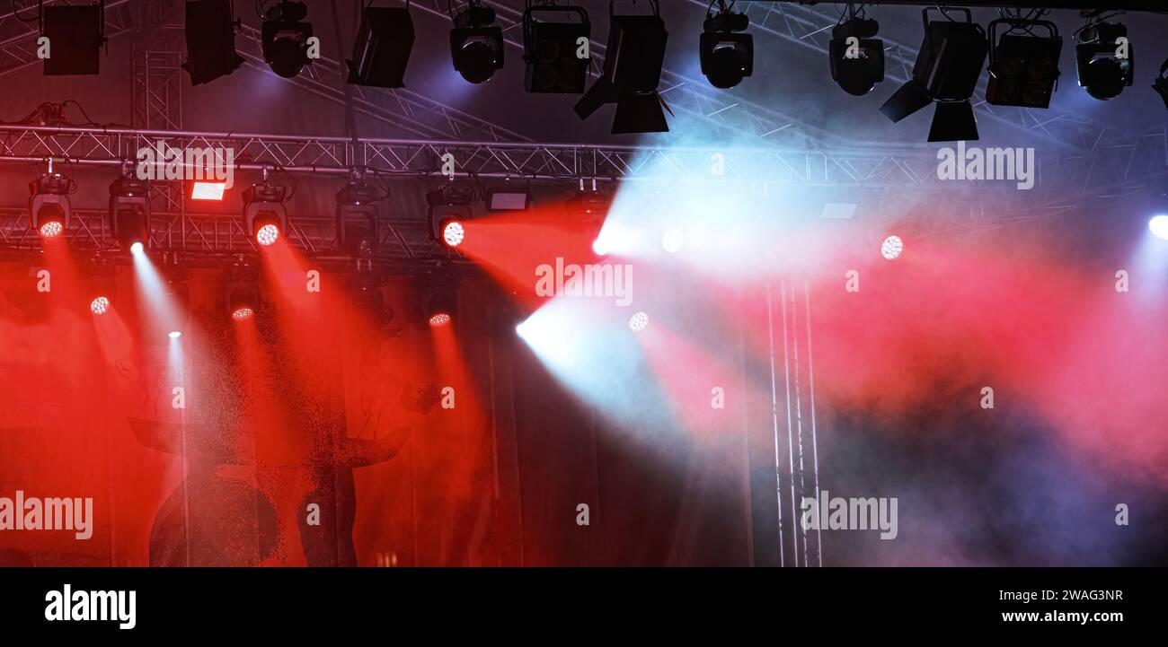projectors light beam through smoke Stock Photo - Alamy