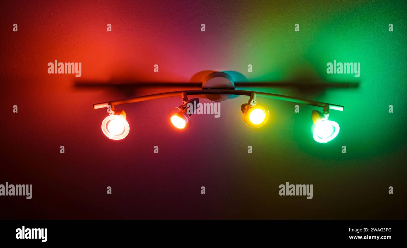red and green light bulbs on the ceiling Stock Photo - Alamy