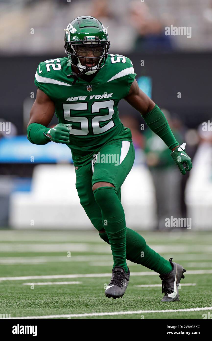New York Jets linebacker Sam Eguavoen (52) warms up before facing the ...