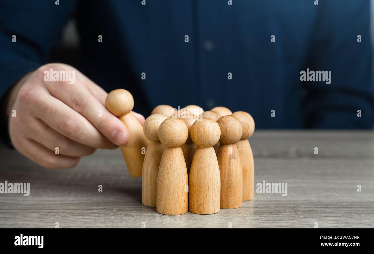 Selecting workers from a pool of candidates. Pull out people from a ...