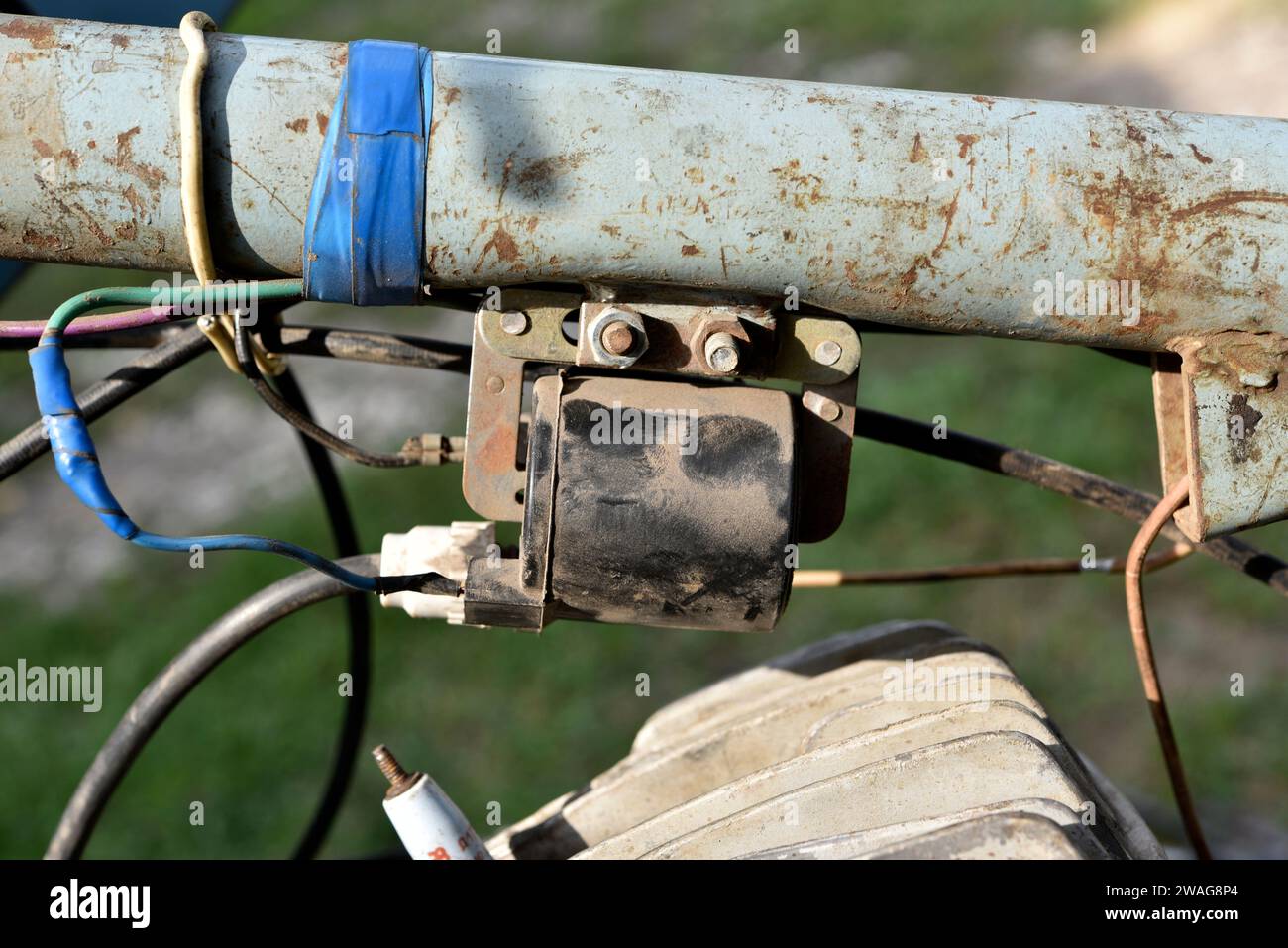 Repair of an old motorcycle. Ignition disassembly. Internal parts of ...