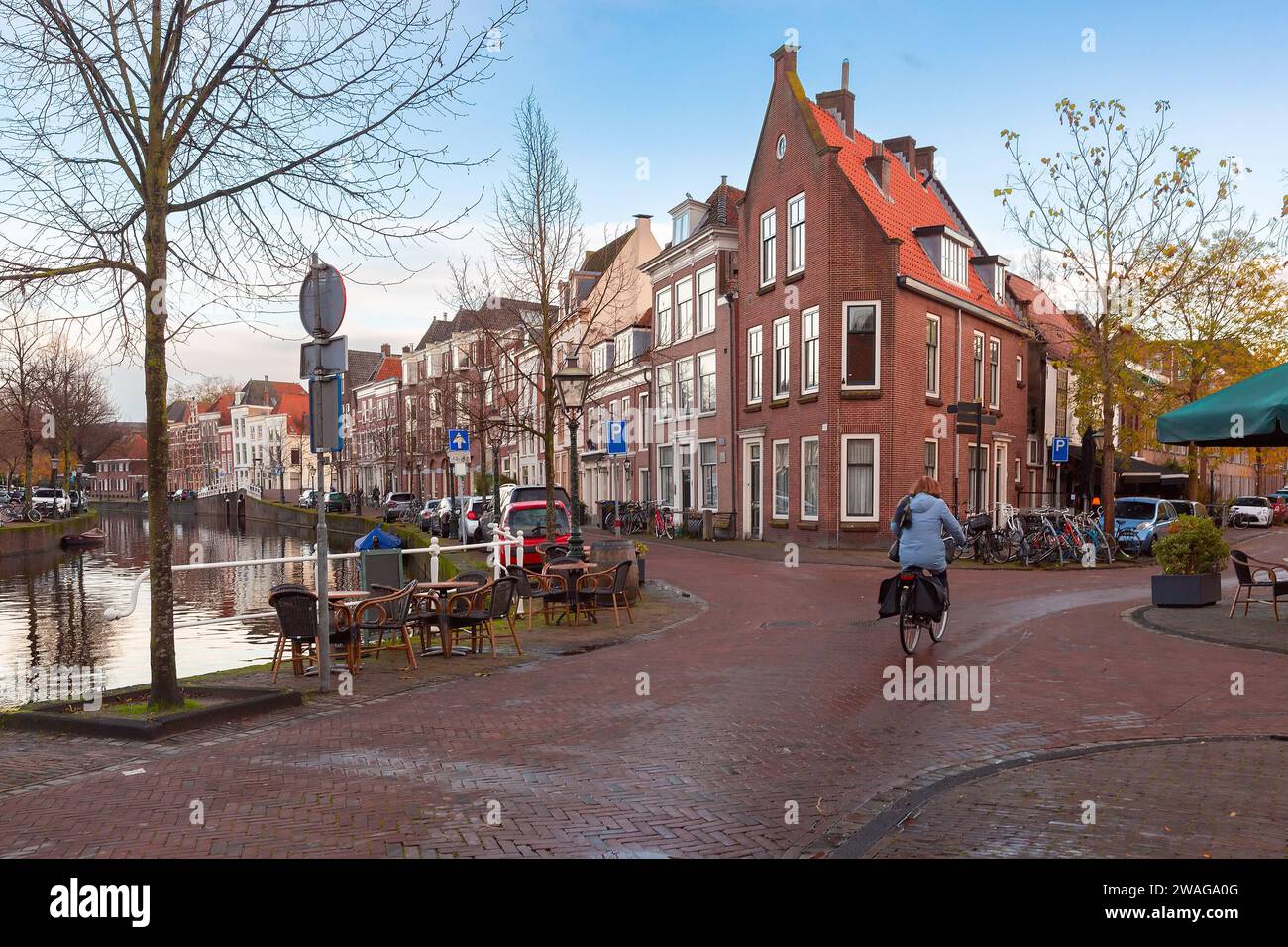 Typical Dutch houses, bridge and canal in Leiden, South Holland ...