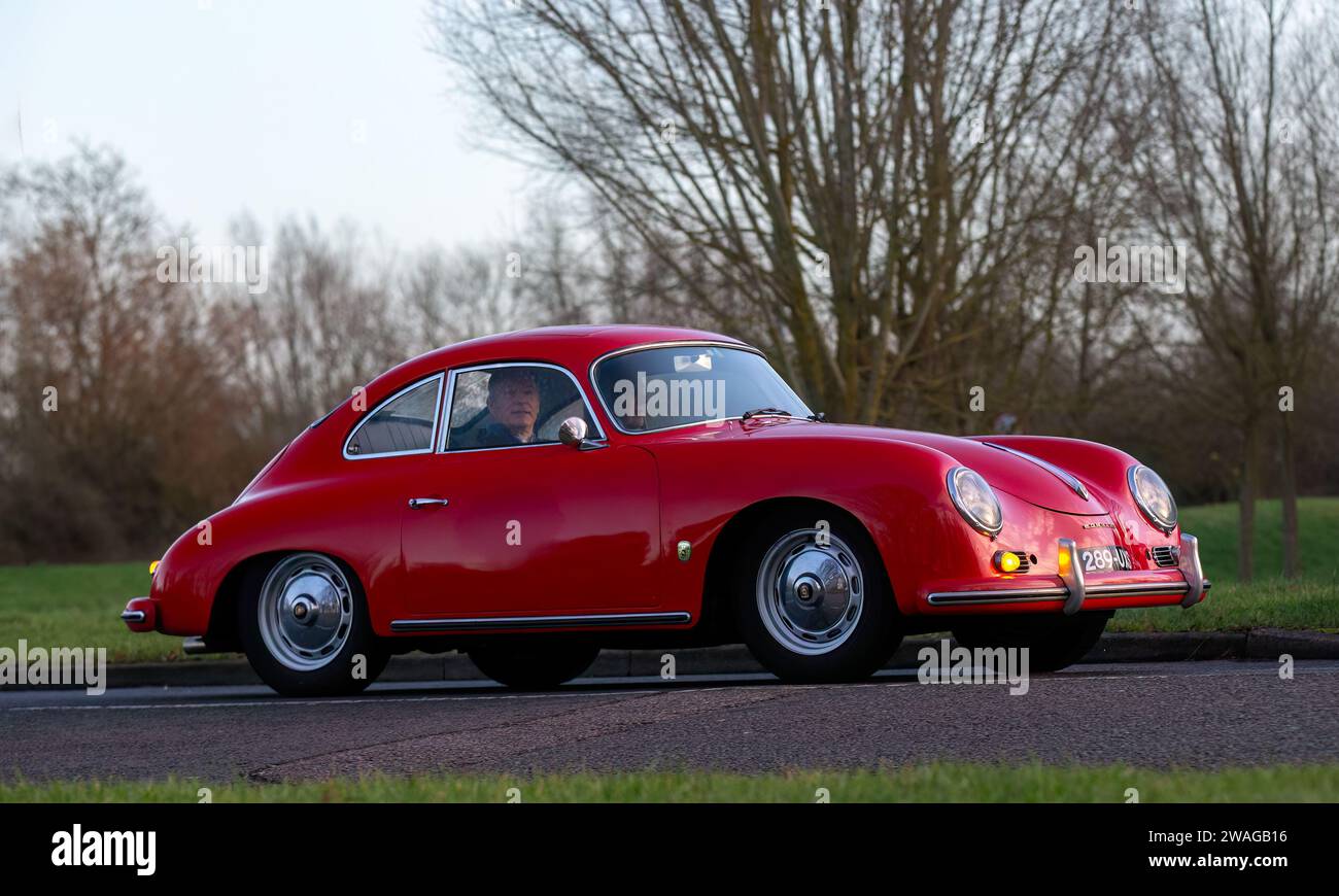 Stony Stratford,UK Jan 1st 2024. 1959 red Porsche 356 car arriving at ...