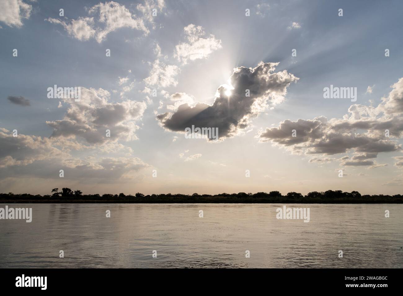 River safari sunset Stock Photo - Alamy