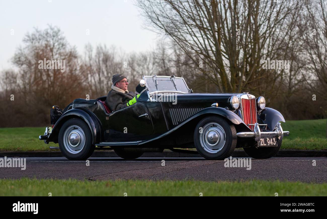 Stony Stratford,UK Jan 1st 2024. 1950 vintage MG T sports car arriving ...
