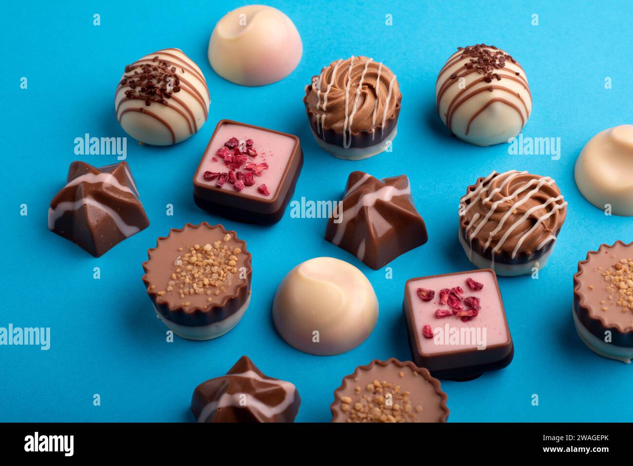 photo, an exquisite set of chocolate candies steals the spotlight. This assortment of assorted ...