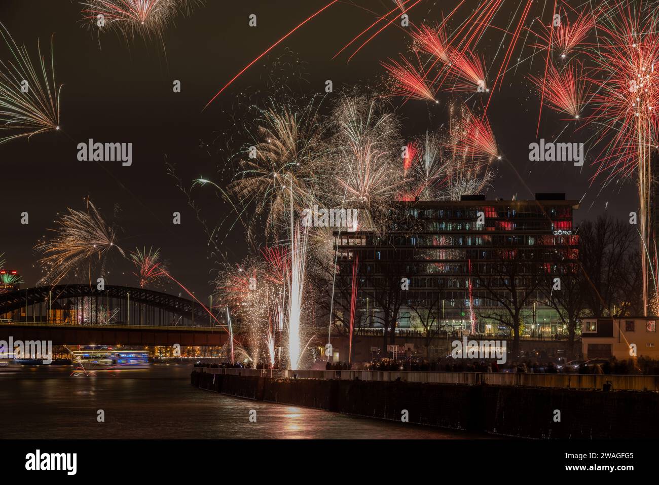 Fireworks over Rhine River in Cologne on a new years eve Stock Photo ...