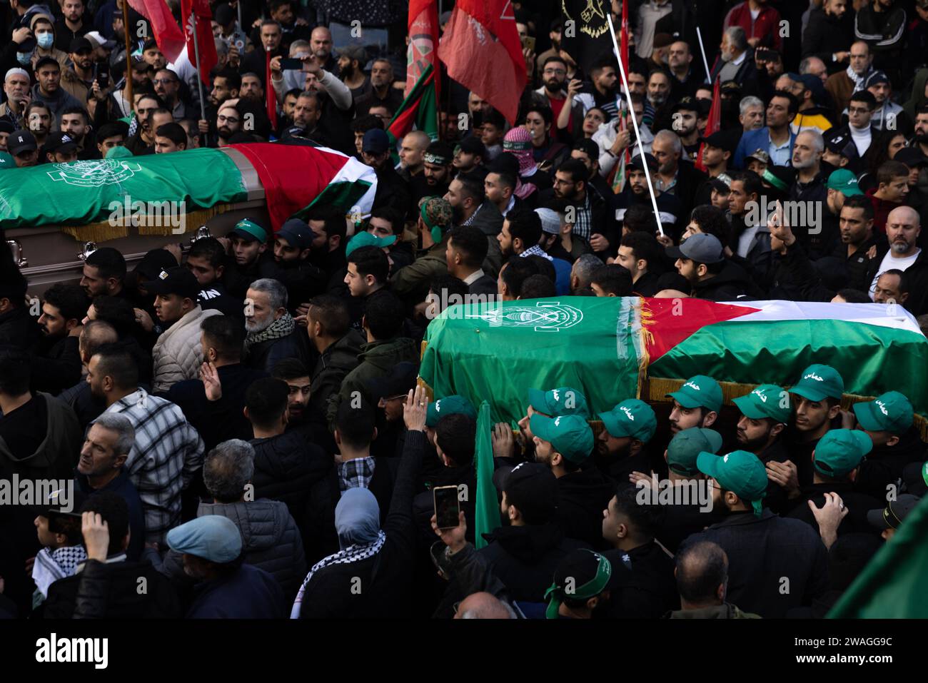 Beirut, Lebanon. 4th Jan, 2024. Men carrying the casket for Saleh al ...