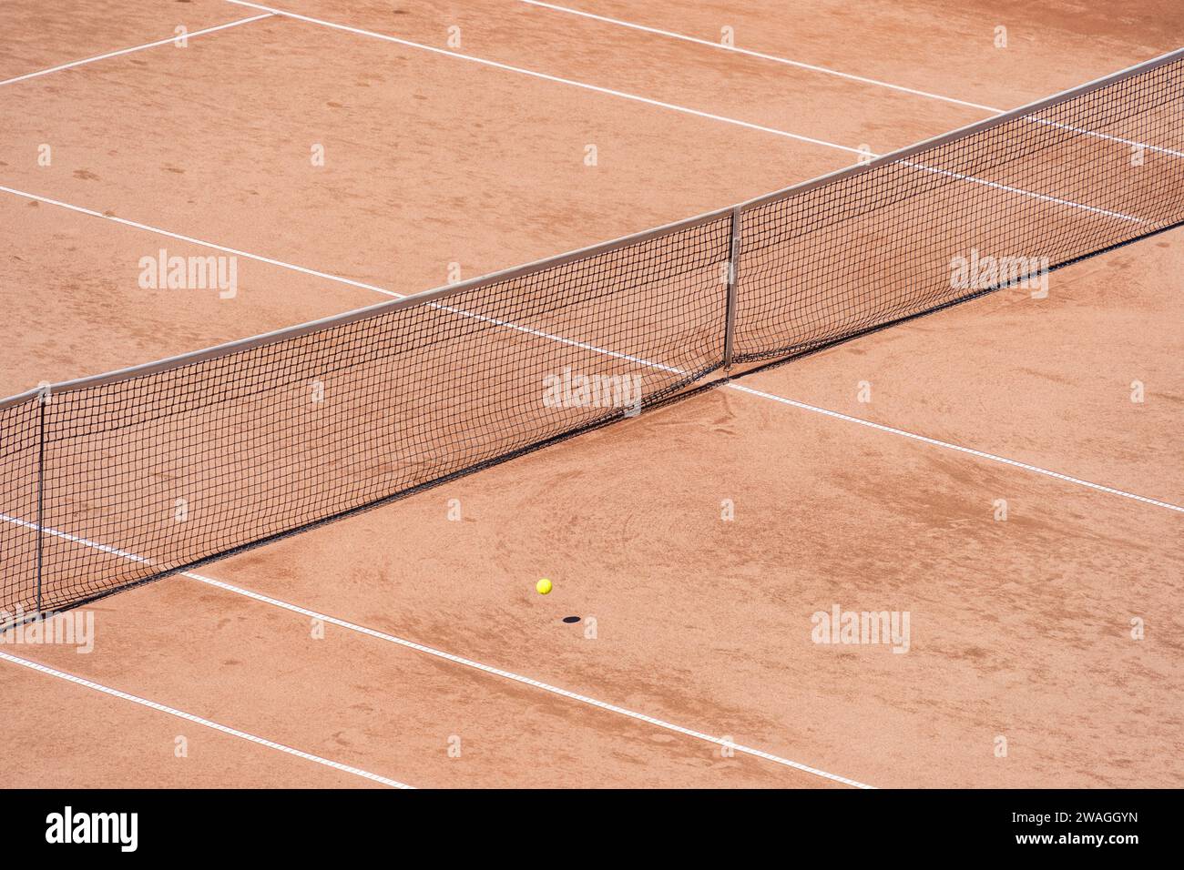 Isolated tennis ball on the clay surface of the tennis court Stock ...