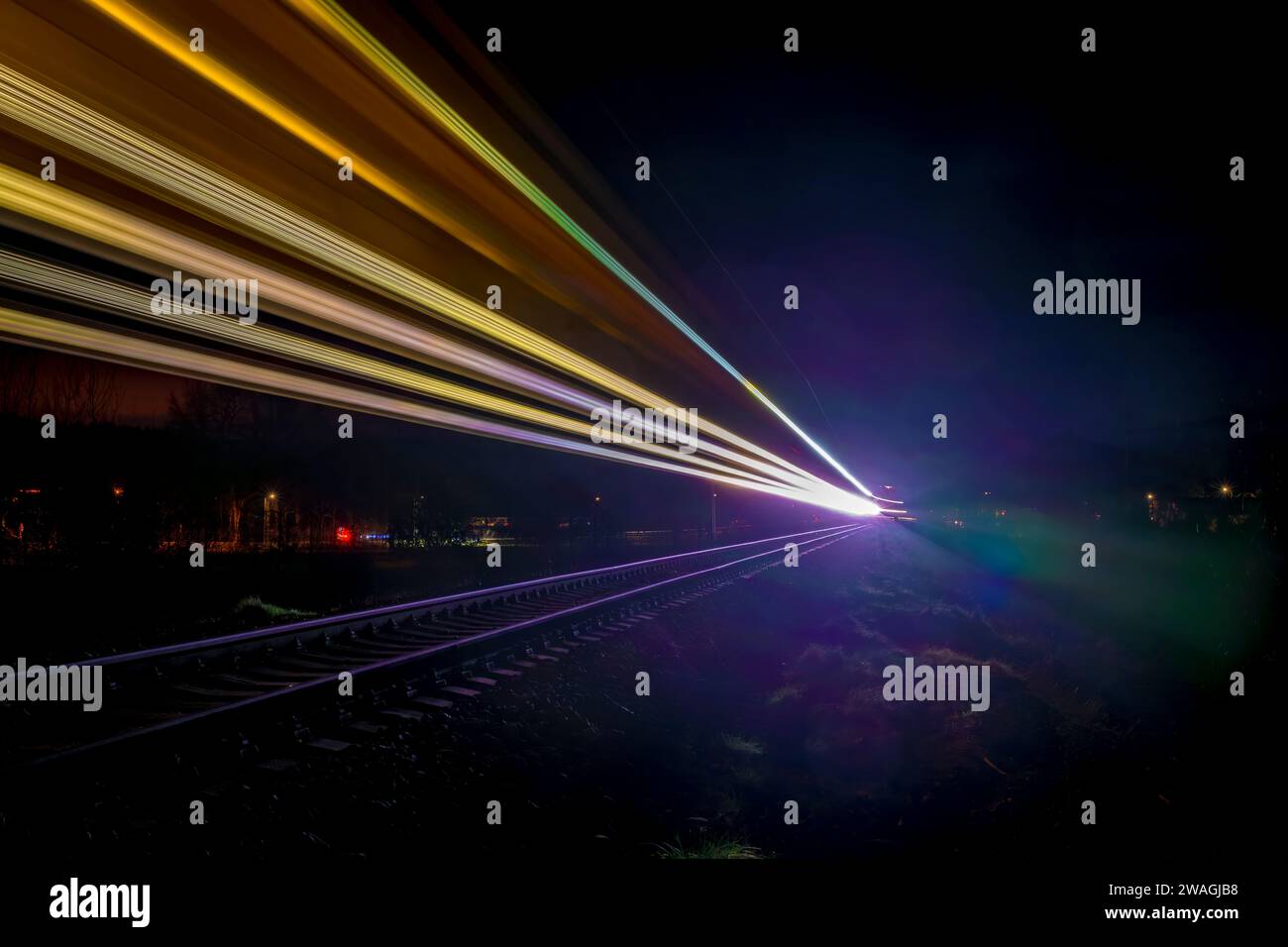 Color train railway light lines in dark night in south Bohemia near ...