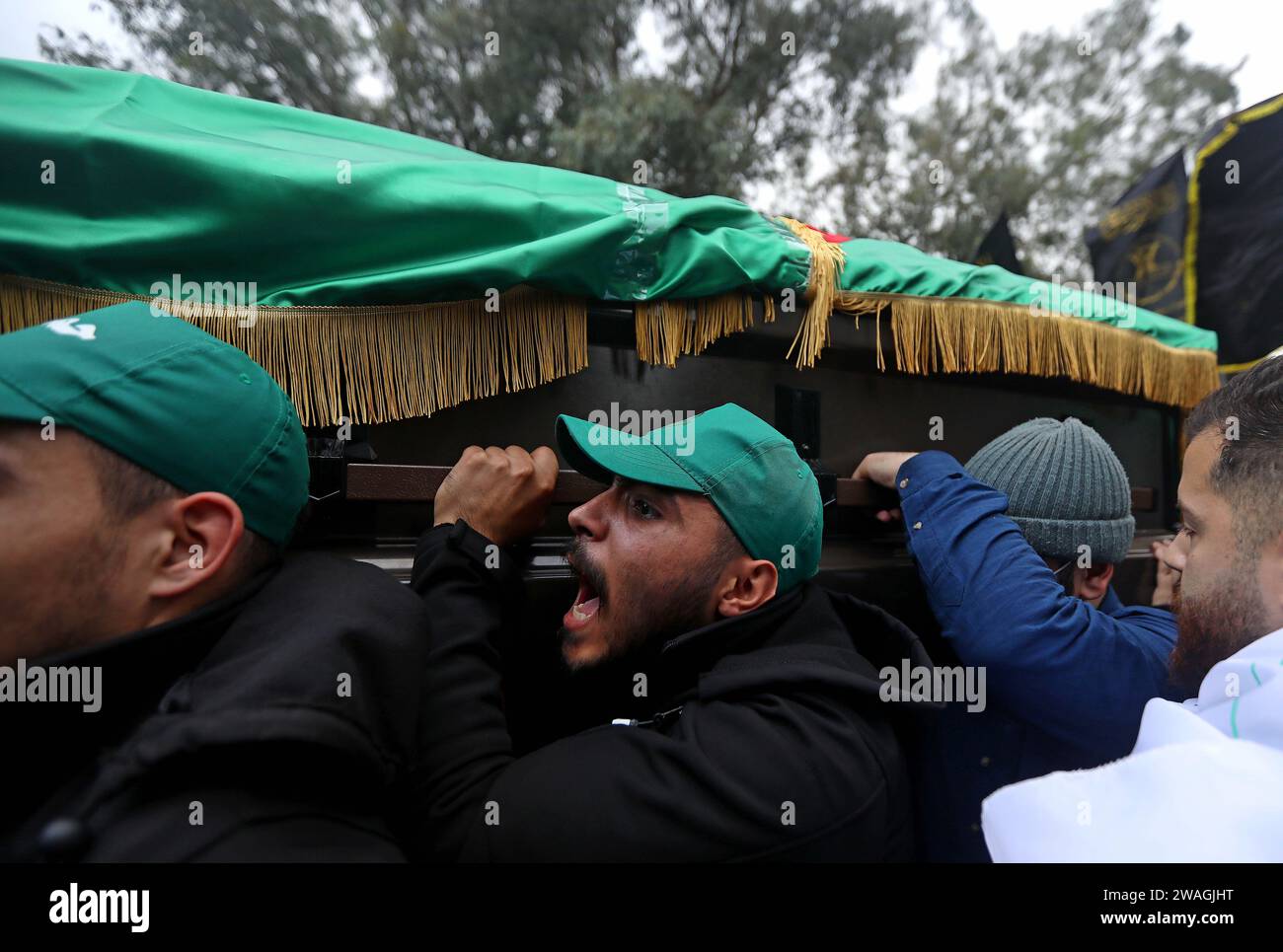 Beirut, Lebanon. 4th Jan, 2024. People attend the funeral of Saleh al ...