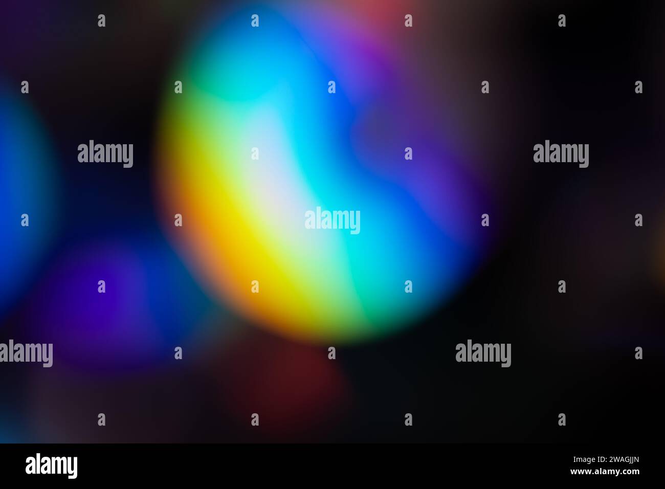 Multi-colored lens flare bokeh. A rainbow flare is similar to the flare ...