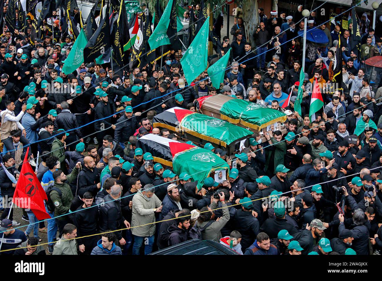 Beirut, Lebanon. 4th Jan, 2024. People attend the funeral of Saleh al ...