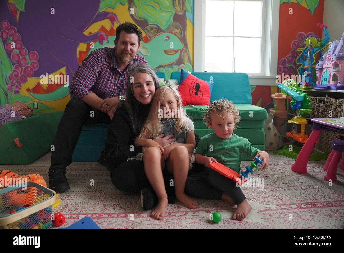 From left, Justin Fell and Katie Czajkowski-Fell sit for a photo with ...