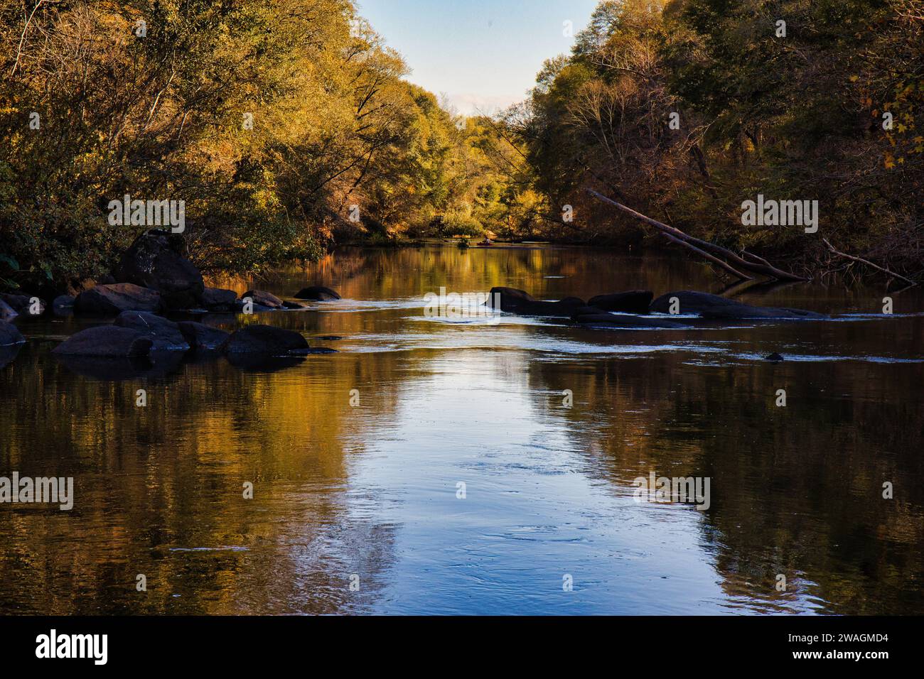 Tranquil landscape of calm river in Georgia with sky and colorful ...