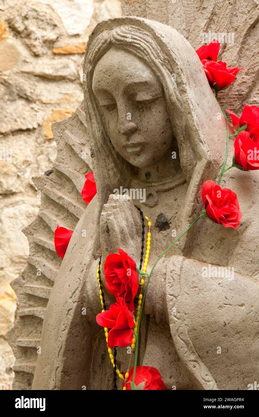 Virgin Mary statue with roses at Mission San Juan, San Antonio Missions ...