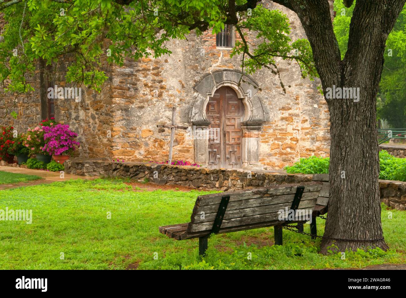 Mission Espada church with bench, San Antonio Missions National ...