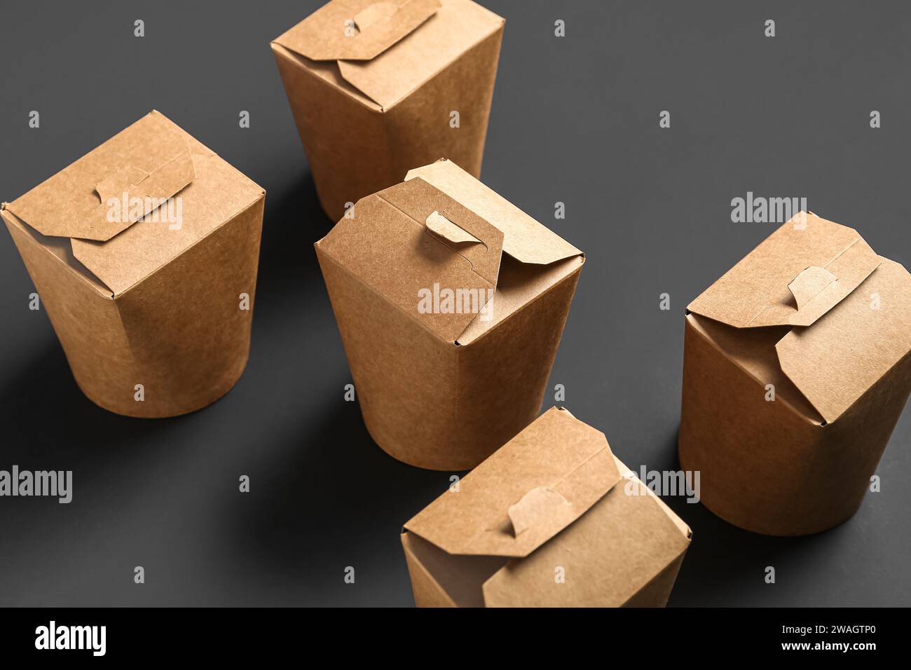 Takeaway paper boxes on black background Stock Photo - Alamy