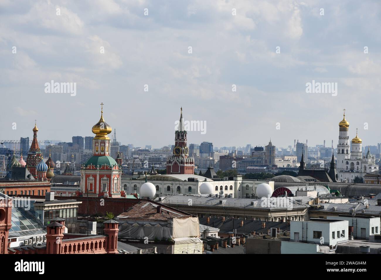 Aerial drone shot of the roofs in Moscow, Russia, with many towers and ...