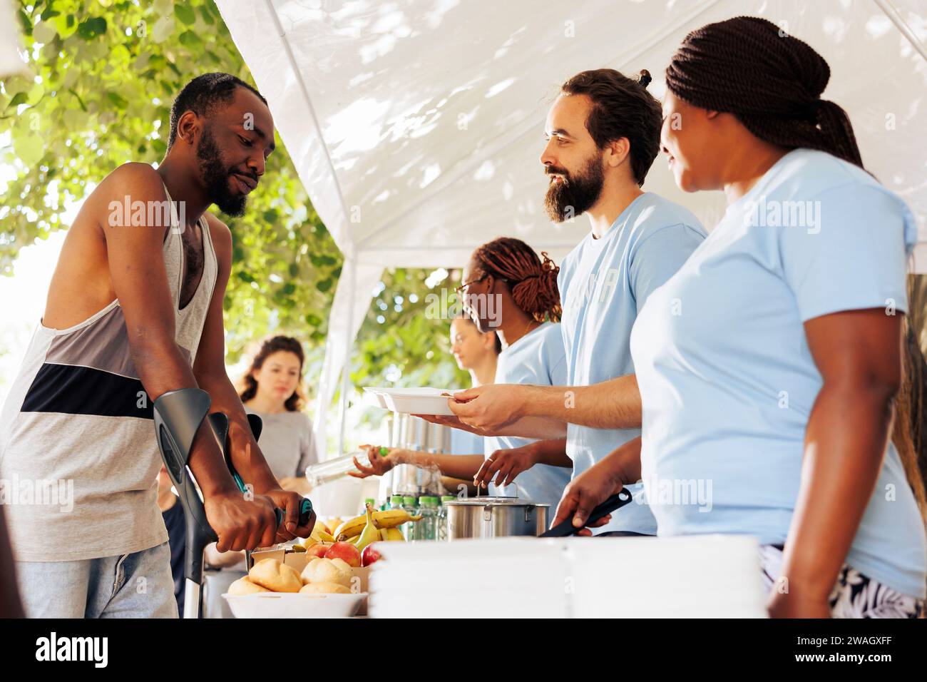 Woman providing food homeless on hi-res stock photography and images ...