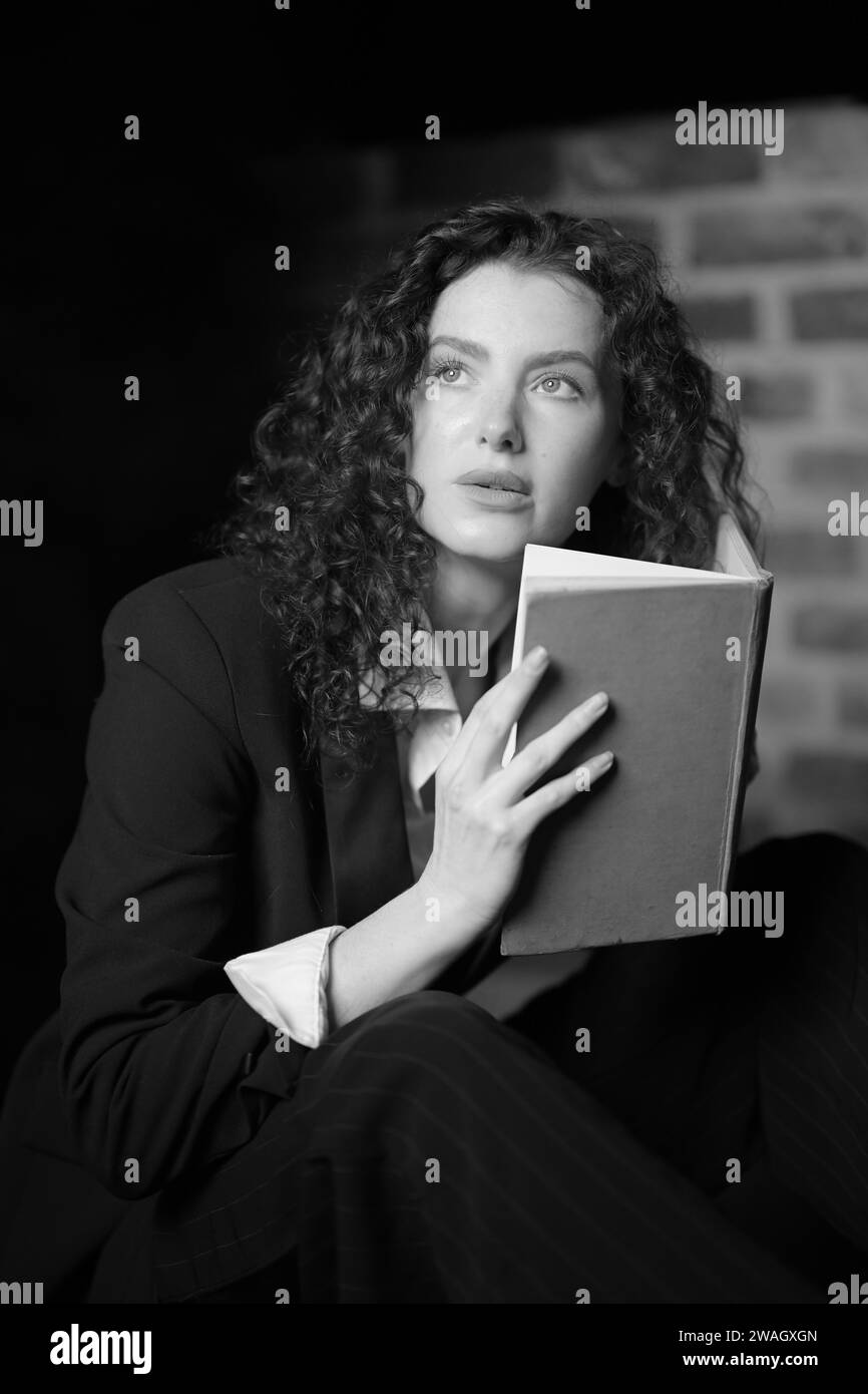 Pretty dark haired girl in mansion Stock Photo - Alamy