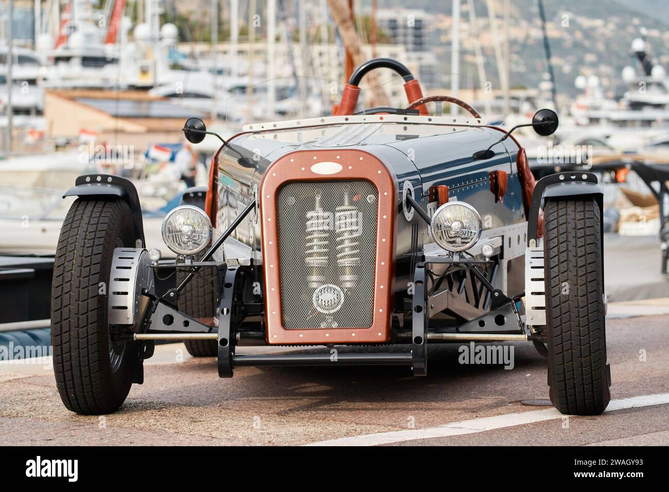 vintage open-top car at the yacht show in Monaco on a sunny day ...