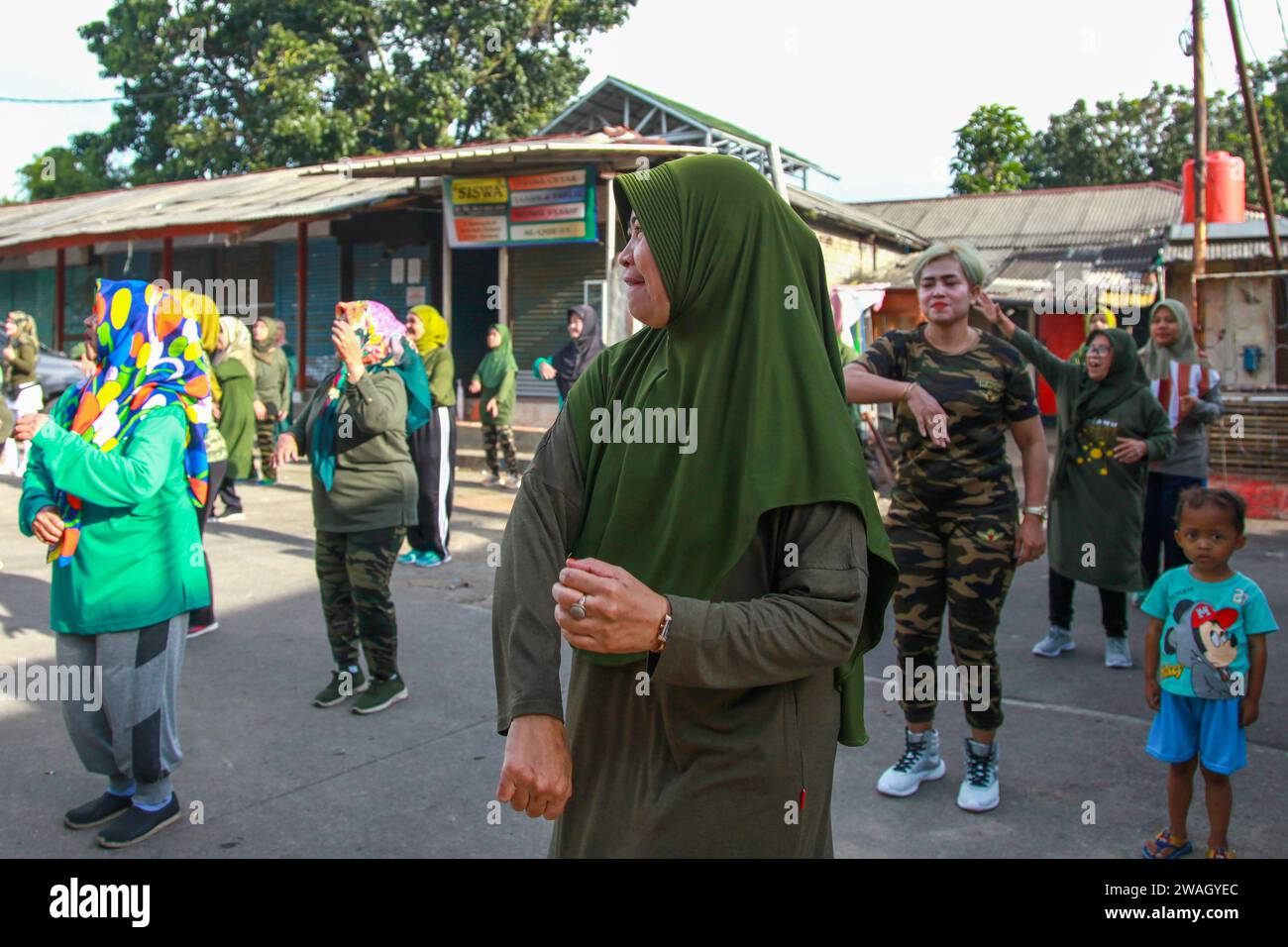 Muslim Women doing early morning Aerobics. The women are mostly middle ...