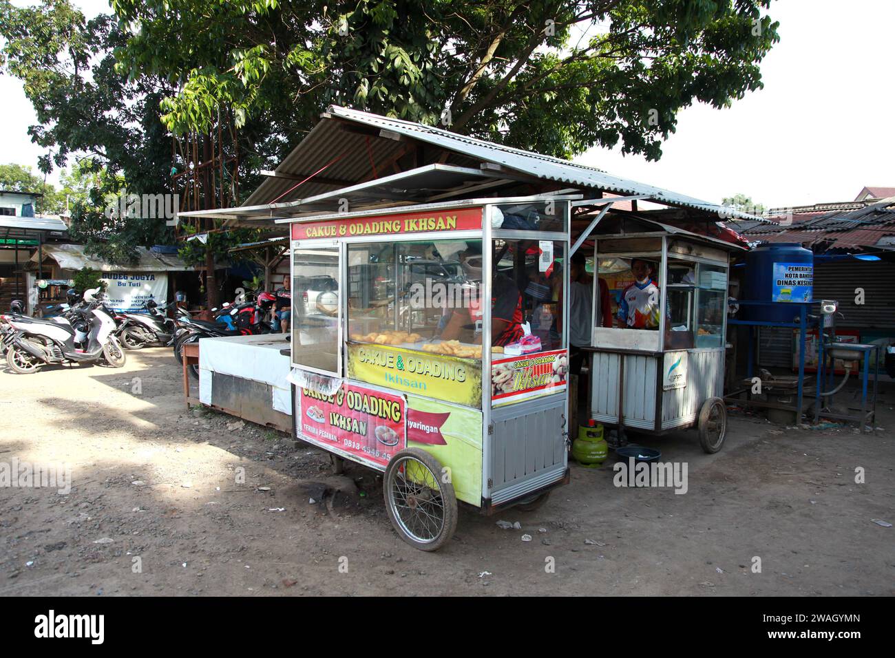 Food being sold at a Street Food Gerobak Stall in Indonesia. This type ...
