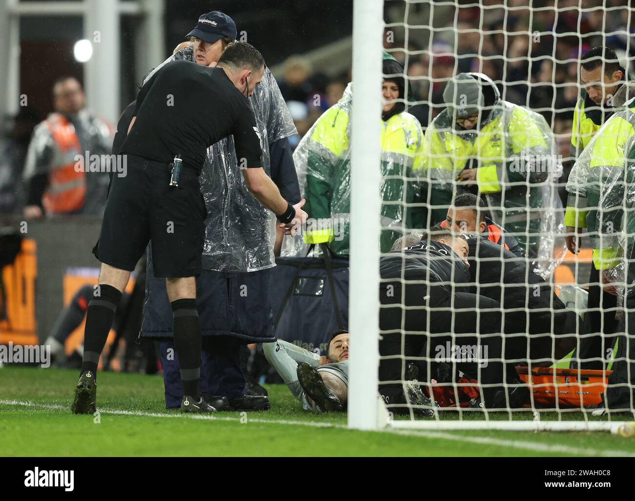 London, UK. 4th Jan, 2024. Referee Chris Kavanagh gestures towards ...