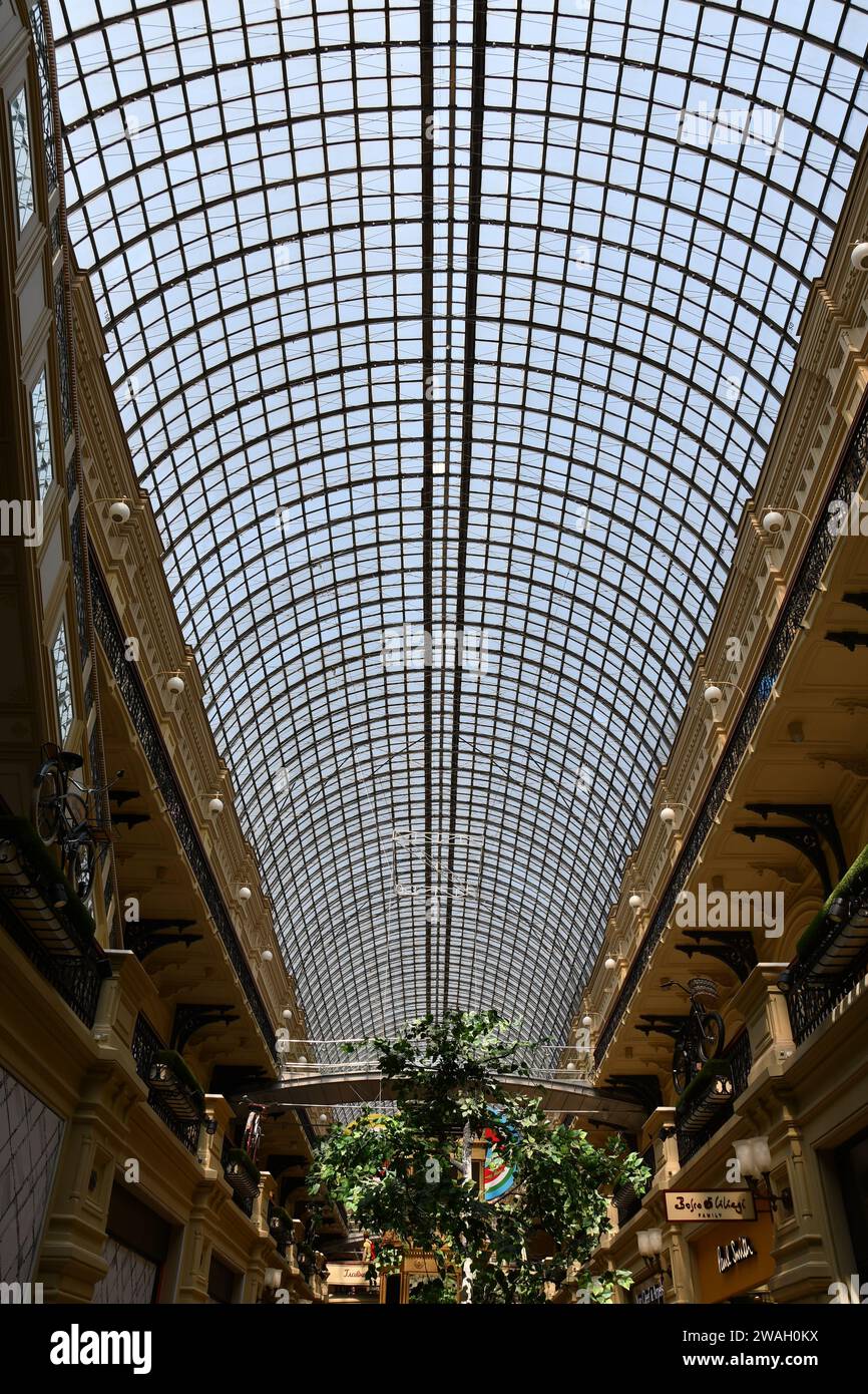 Interior of the Gum department store with the glass roof in Moscow ...