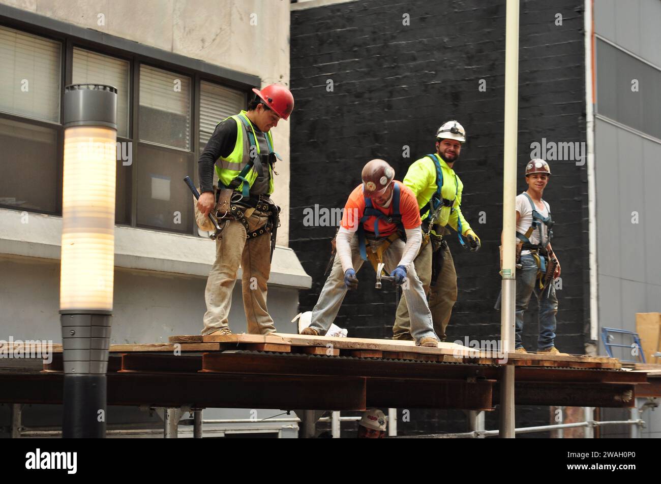 Four construction workers hi-res stock photography and images - Alamy