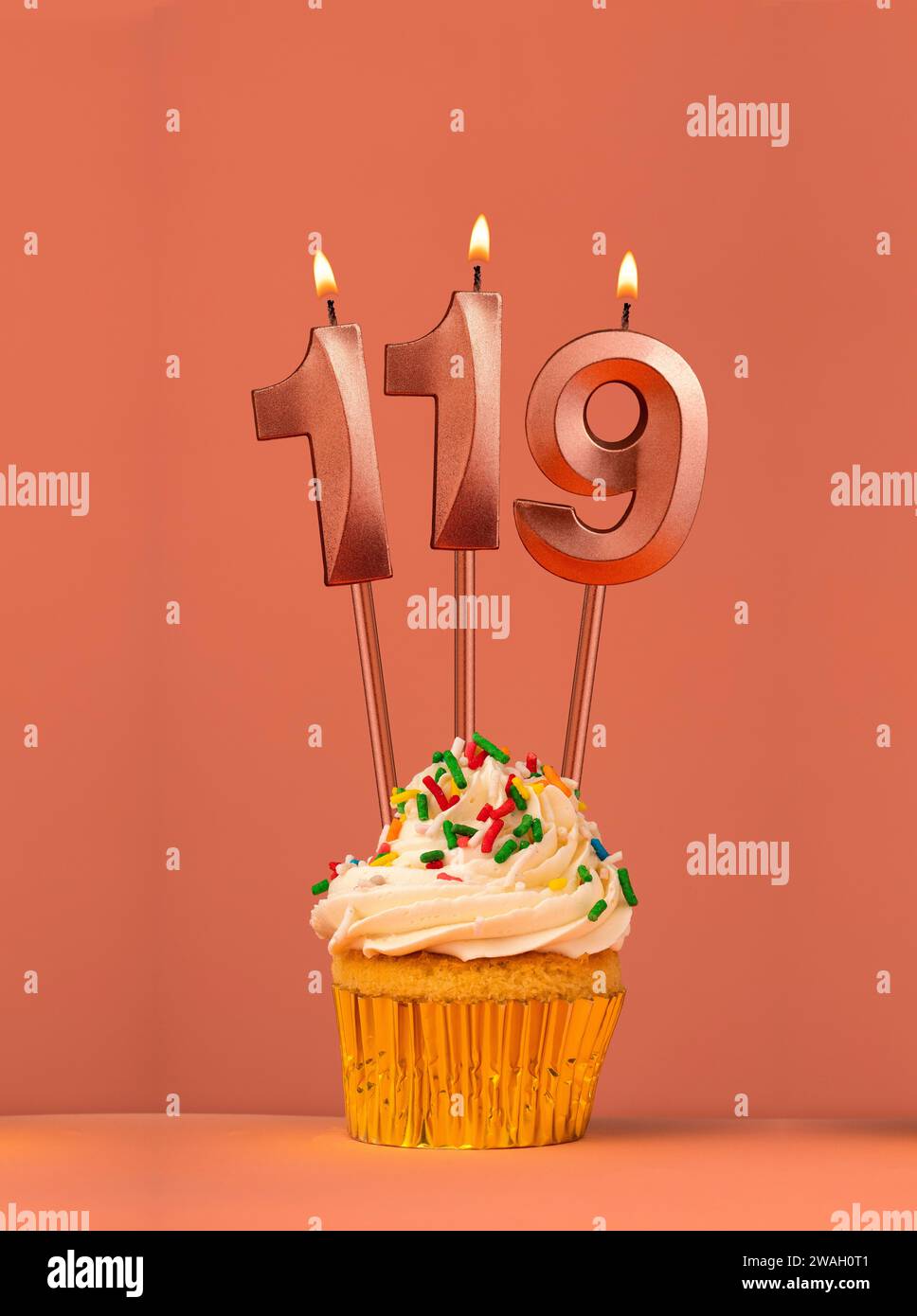 Birthday cake with candle number 119 - Coral fusion background Stock ...