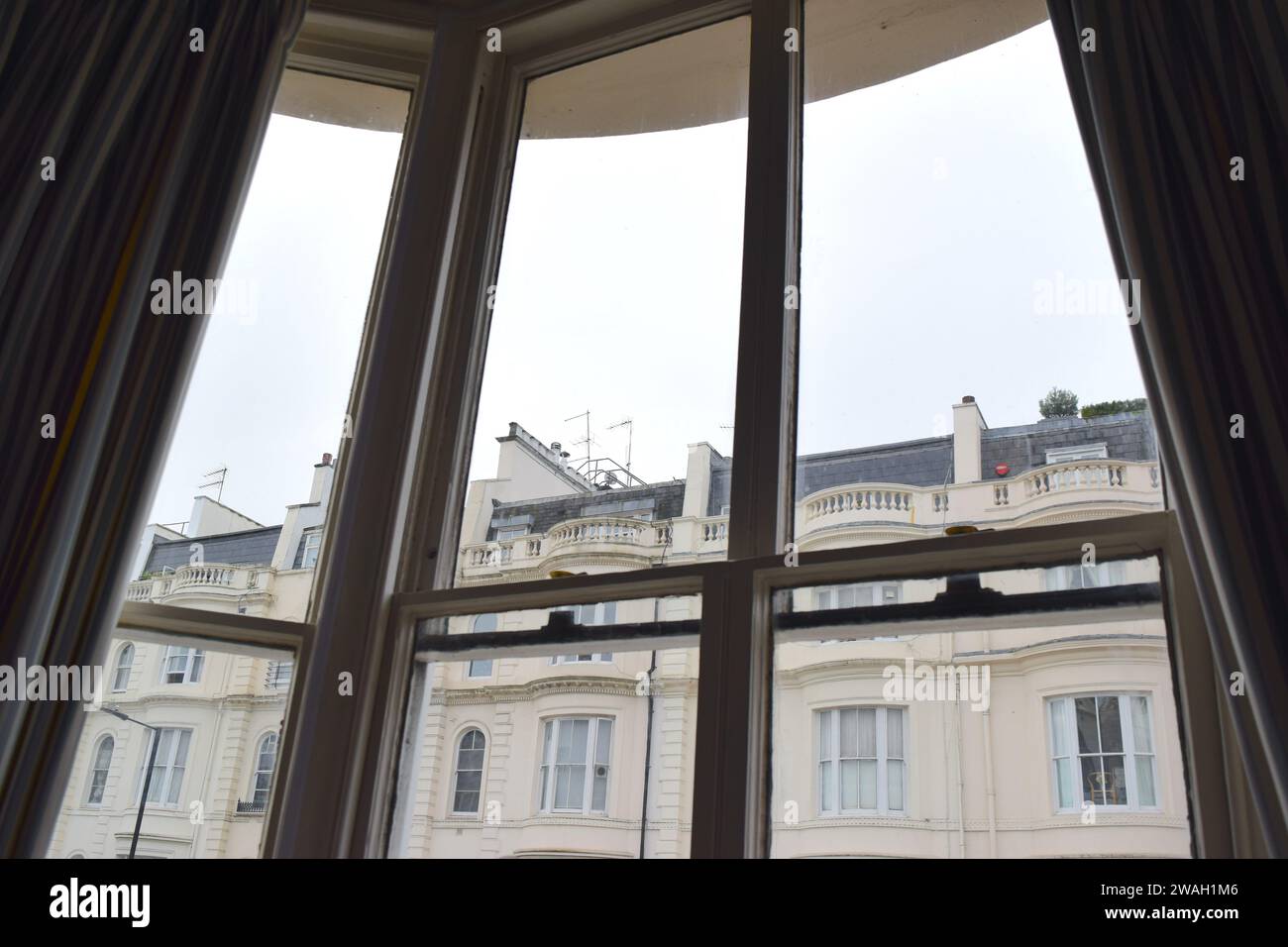 Window view with London Victorian flats Stock Photo - Alamy