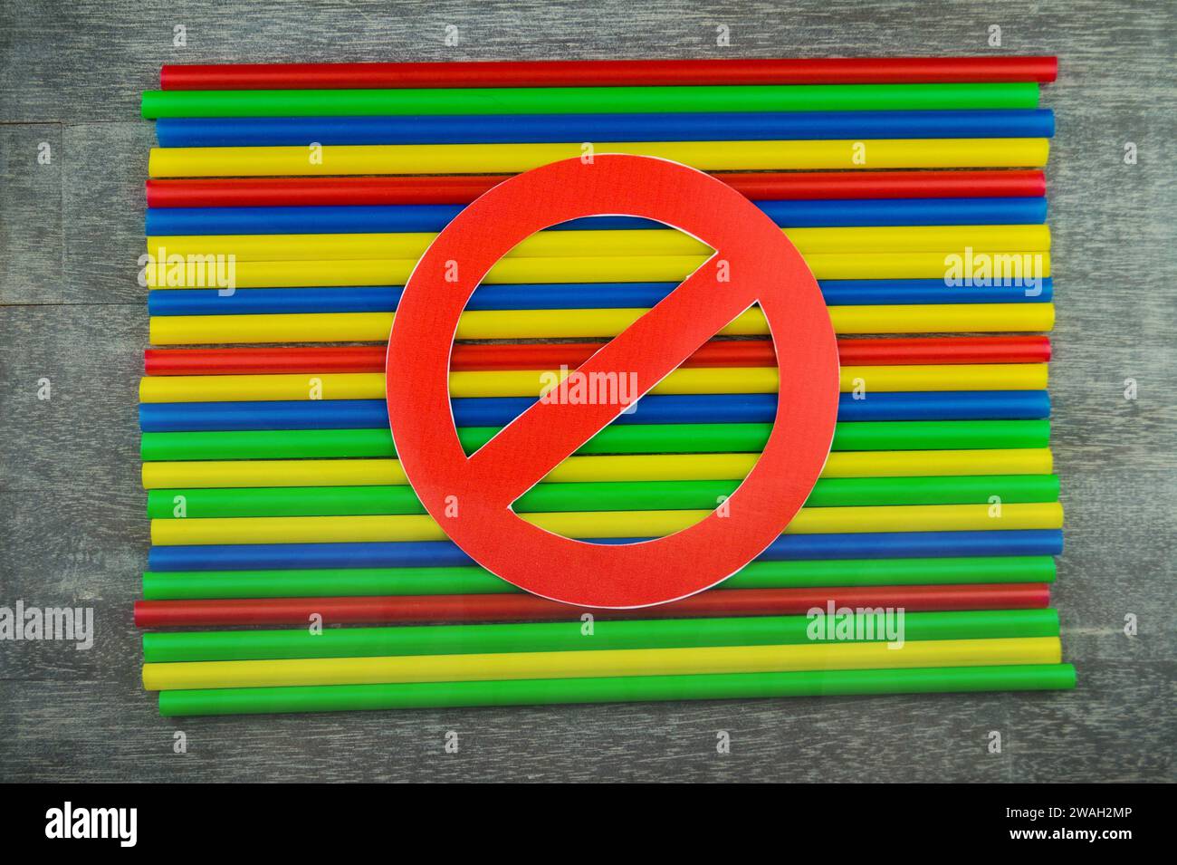 colorful plastic straws with probibition sign Stock Photo - Alamy